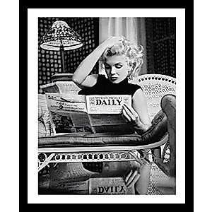 Buyartforless Framed Marilyn Monroe Reading Motion Picture Daily 1955 by Ed Feingersh 20x16 Photograph Art Print Poster