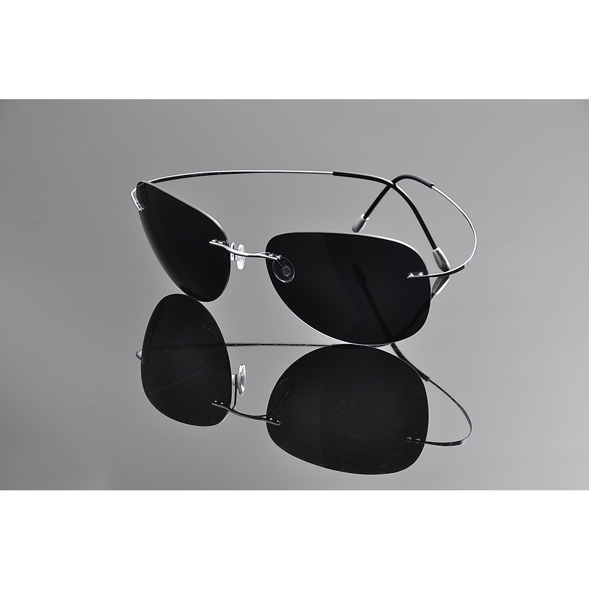 De Ding Mens rimless titanium polarized Sunglasses (silver, gray)