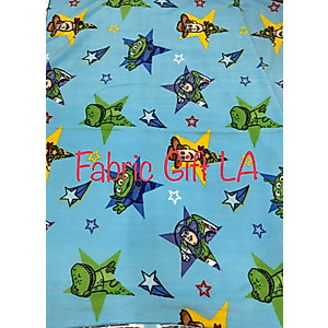Disney Toy Story 4 Character Stars on Sky Blue Fleece from Springs Creative Buzz Light Year and Woody Fabric by The Yard
