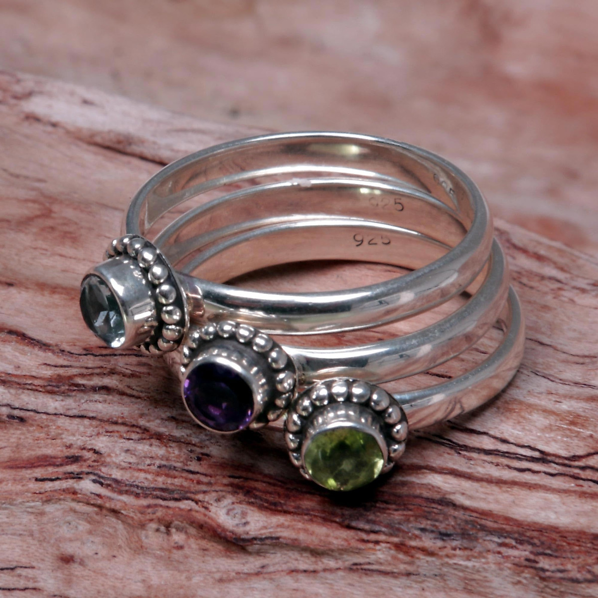 NOVICA Artisan Handmade Multigemstone Stacking Rings Sterling Silver Set of 3 Amethyst Blue Topaz Peridot Green Purple Multicolor Indonesia Modern Birthstone [crownbezel 0.2 in H x 0.2 in Diam. Band ]