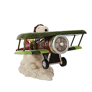 Enesco Peanuts by Jim Shore Snoopy Flying Christmas Ace Plane Figurine, 5.12 Inch, Multicolor