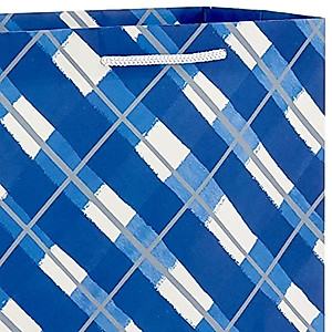 Hallmark 9" Medium Winter Gift Bags (4 Bags: Blue with Snowflakes, Plaid, Polar Bear, Christmas Trees) for Christmas, Hanukkah, Birthdays