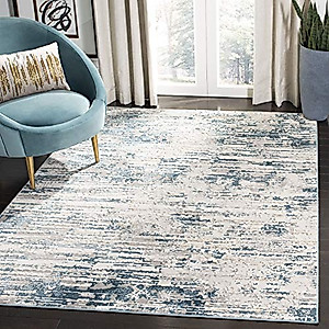 SAFAVIEH Vogue Collection 6'7" x 9' Cream / Teal VGE145A Modern Abstract Area Rug