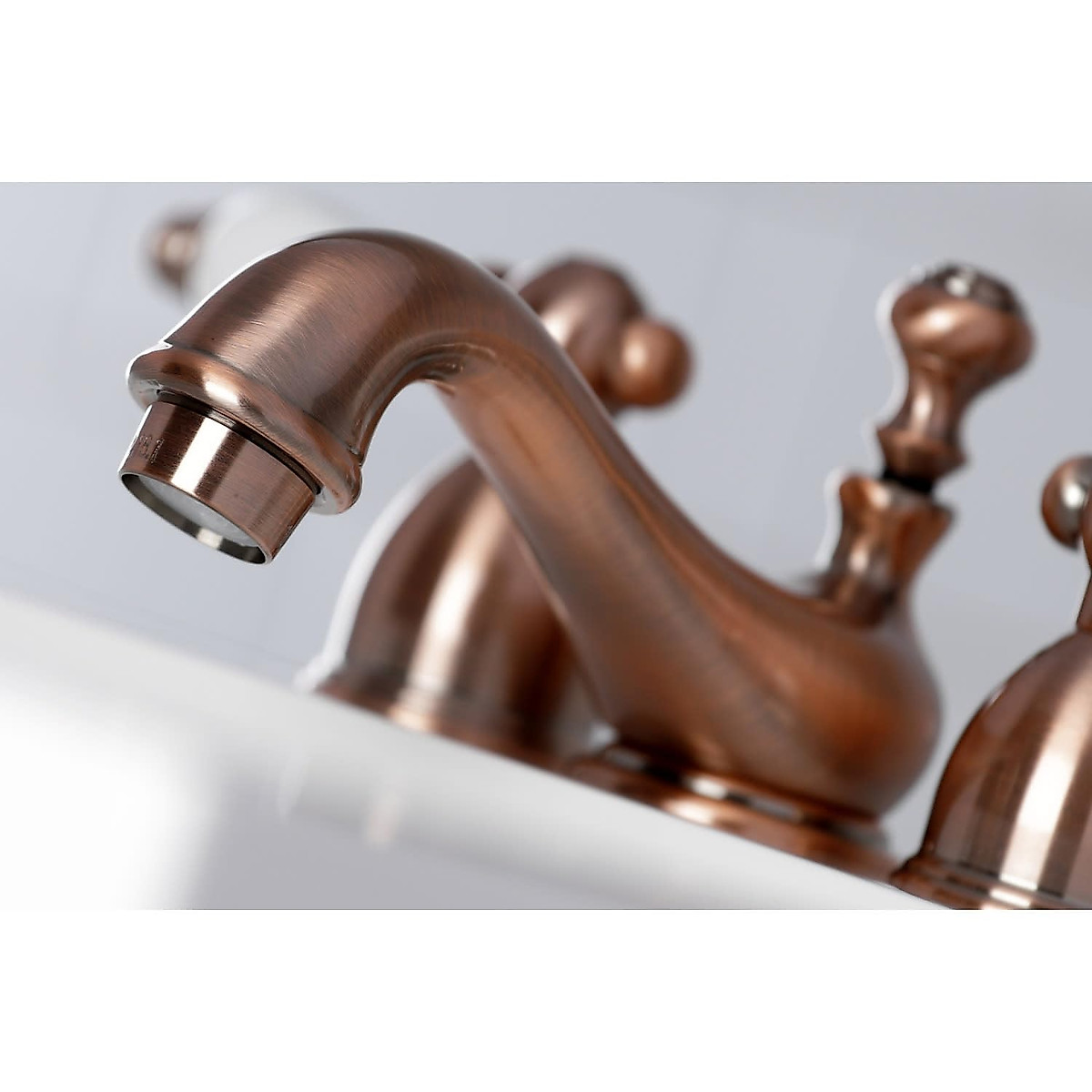 Kingston Brass KS3955PL Restoration Mini Widespread Lavatory Faucet with Porcelain Lever Handle, Oil Rubbed Bronze