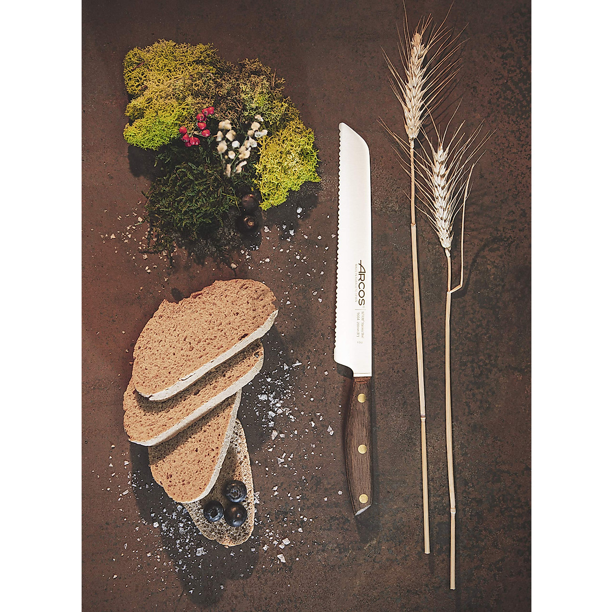 ARCOS Bread Knife 8 Inch Nitrum Stainless Steel and 200 mm blade. Obtain a great variety of cuts for your food. Ideal knife for daily domestic use. Series Nordika. Color Brown.