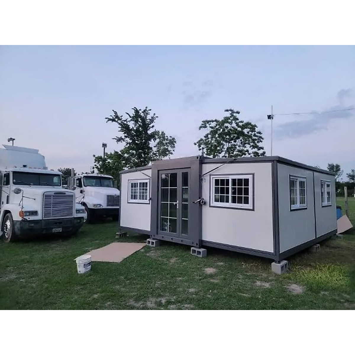 Mobile Prefabricated Tiny house, 19ft x 20ft private space of 2 bed rooms, living room, restroom and kitchen, Ideal for Air bnb hosting, Office or Workshop.
