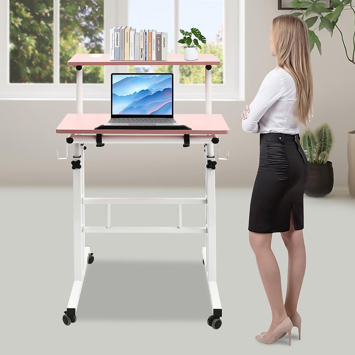 LEYSRIS Mobile Standing Desk Stand up Computer Desk Workstation with Universal Wheels, Adjustable Height Dual Desktop Tilting Panel Rolling Computer Cart with 2 USB Interfaces and 2 Sockets (Pink)