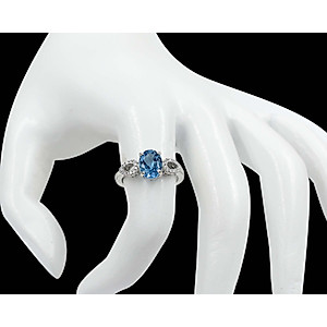 925 Sterling Silver Natural 9X7 MM Oval Cut Swiss Blue Topaz December Birthstone Solitaire Unisex Proposal Engagement Ring Wedding Jewelry Gift For Her (Rhodium Plated Silver, 7.5)