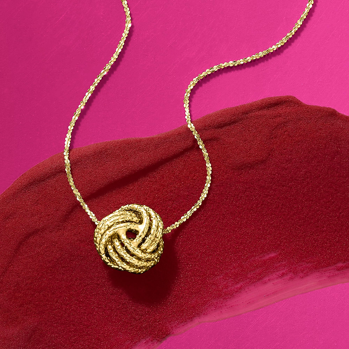 Ross-Simons Italian 14kt Yellow Gold Textured Love Knot Necklace. 18 inches