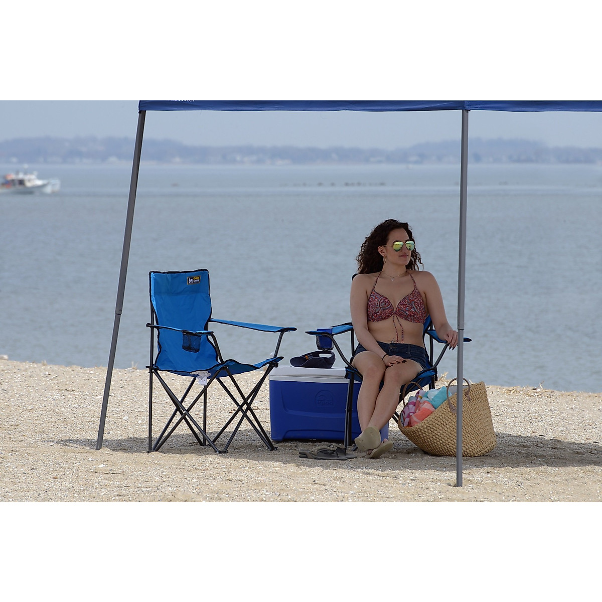 Quik Chair Portable Folding Chair with Arm Rest Cup Holder and Carrying and Storage Bag, Blue