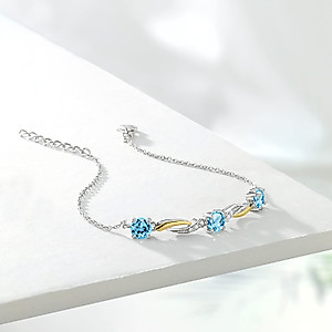Gem Stone King 1.99 Ct Swiss Blue Topaz G-H Lab Grown Diamond 925 Silver and 10K Yellow Gold 7 Inch Tennis Bracelet For Women with 1 Inch Extender