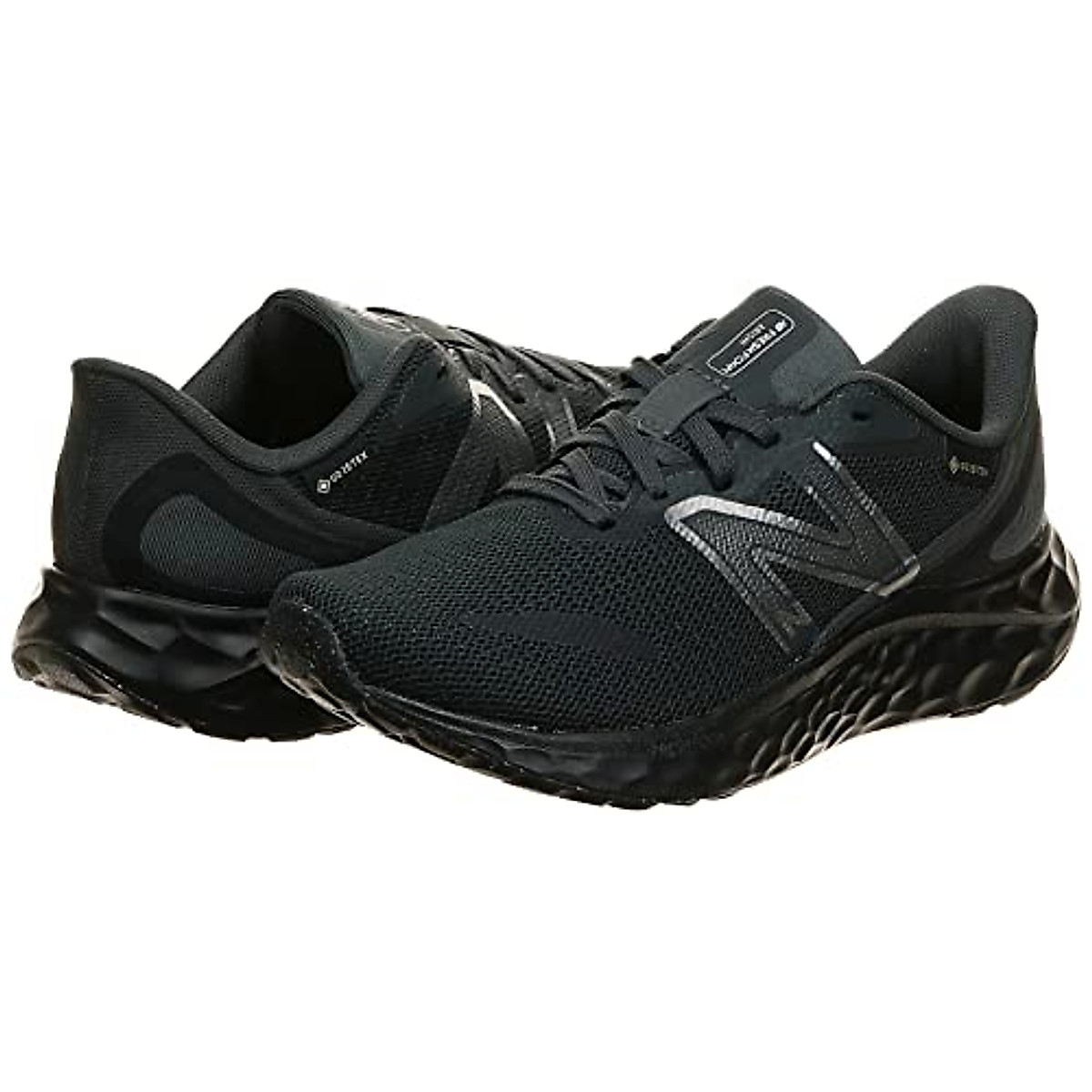 New Balance Women's Fresh Foam Arishi V4 Running Shoe, Black/Black, 9