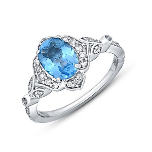 Jewelili Enchanted Disney Fine Jewelry Sterling Silver 1/5 Cttw Diamond and Swiss Blue Topaz Jasmine Ring Size 7