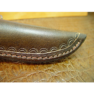 Custom Leather Vertical Knife Sheath. The Sheath Is Made Out of 10 Ounce Water Buffalo Hide Leather with a Border Tooling Dyed Dark Brown. The Sheath Is Made Out of Water Buffalo Leather the Water Buffalo Leather Is Very Soft Pliable and Durable. The Shea