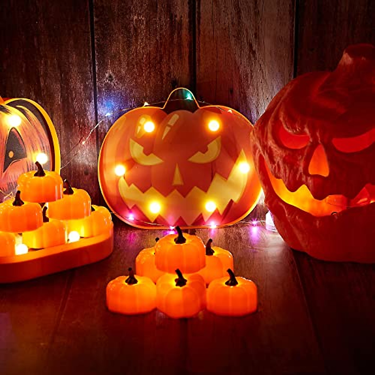 IMAGE Flickering Pumpkin Tea Lights 12 Pack Flickering LED Pumpkin Lights with Battery Operated Flameless Pumpkin Tealight Candles for Halloween, Christmas, Thanksgiving and Theme Parties