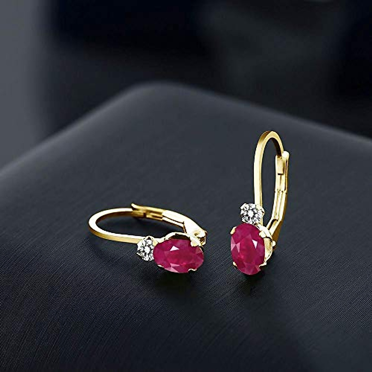Gem Stone King 14K Yellow Gold Red Ruby and White Diamond Leverback Earrings For Women | 1.27 Cttw | Gemstone July Birthstone | Oval 6X4MM, Round 2MM | 3/4 Inch