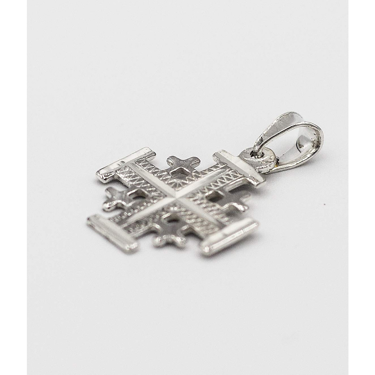 Sterling Silver (925) Jerusalem Crusader's cross Pendant Handcrafted in the Holy Land. Engraved by diamond cutting machine.