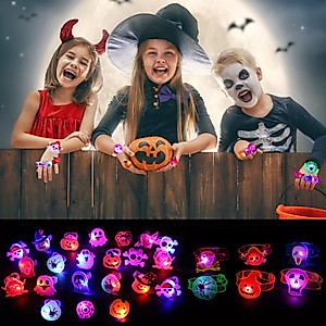 CCINEE Halloween Light up Party Favors Toys for kids, 32pcs 20 Rings+12 Bracelets LED Accessories Glow in the Dark Toys Rubber Ghost Pumpkin Skeleton for Halloween Party Supplies Decorations Gift