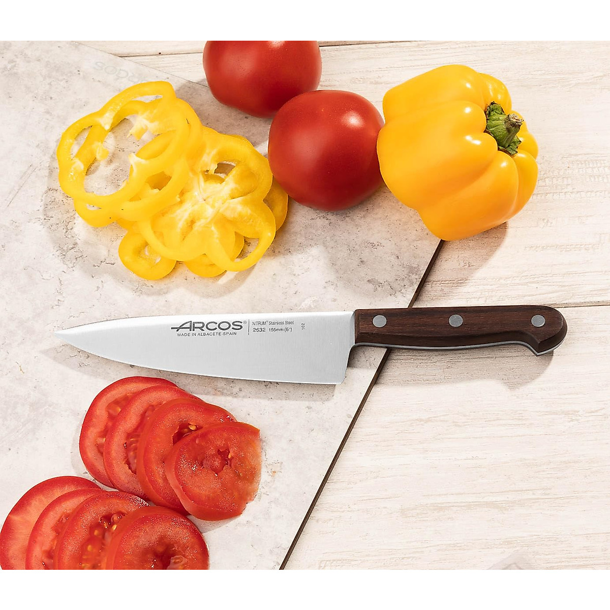 ARCOS Atlantico Series Chef Knife - 6" Nitrum Stainless Steel Blade with Rosewood Brown Handle - Elegant and Durable Design (7"). Atlantico Series. Color Brown