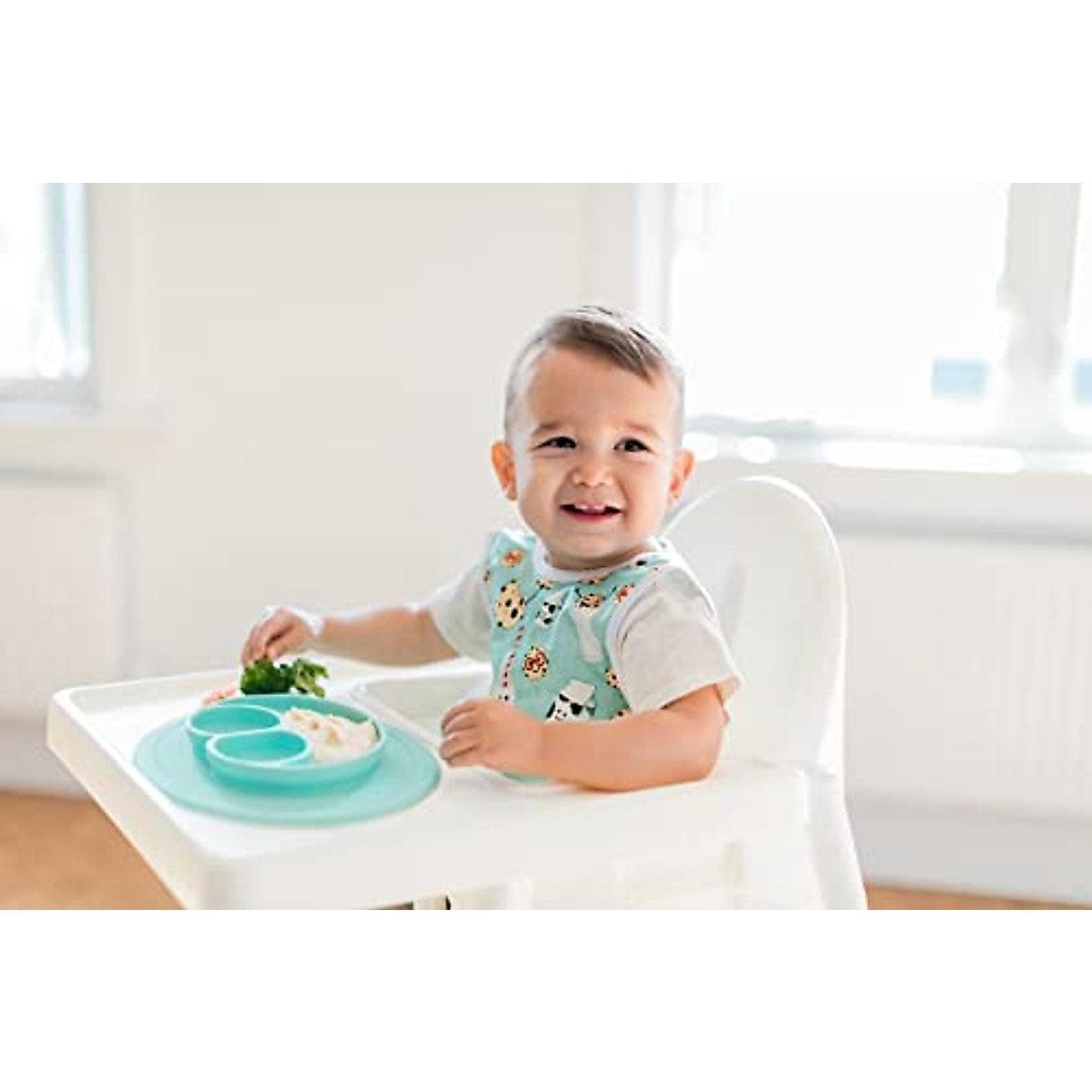 ezpz Mini Mat - 100% Silicone Suction Plate with Built-in Placemat for Infants + Toddlers - First Foods + Self-Feeding - Comes with a Reusable Travel Bag (Aqua)