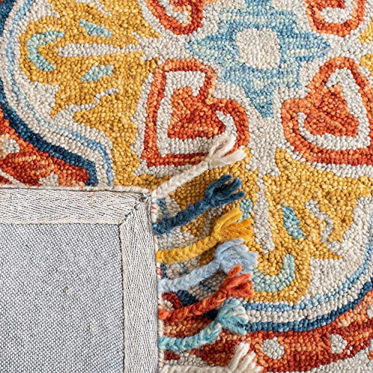 SAFAVIEH Aspen Collection Area Rug - 5' x 8', Beige & Rust, Handmade Boho Braided Tassel Wool, Ideal for High Traffic Areas in Living Room, Bedroom (APN217A)