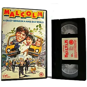 MALCOLM---A CRAZY GENIUS IN A MAD , BAD WORLD