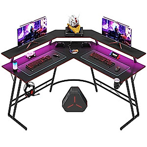 Flamaker Gaming Desk with LED Lights & Power Outlets, L-Shaped Computer Corner Desk with Carbon Fiber Surface & Monitor Stand, Ergonomic Gamer Table with Cup Holder, Headphone Hook, Black