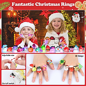 Hekaty 50PCS 3D Christmas Light Up Rings Toy Christmas Party Favors Flash Finger Ring For Kid Ring Glow in The Dark Party Supplies Christmas Stocking Stuffers Christmas Gifts Christmas Party Toy Rings