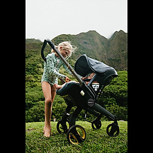 Doona Infant Car Seat & Latch Base - Rear Facing, Car Seat to Stroller in Seconds - US Version, Racing Green