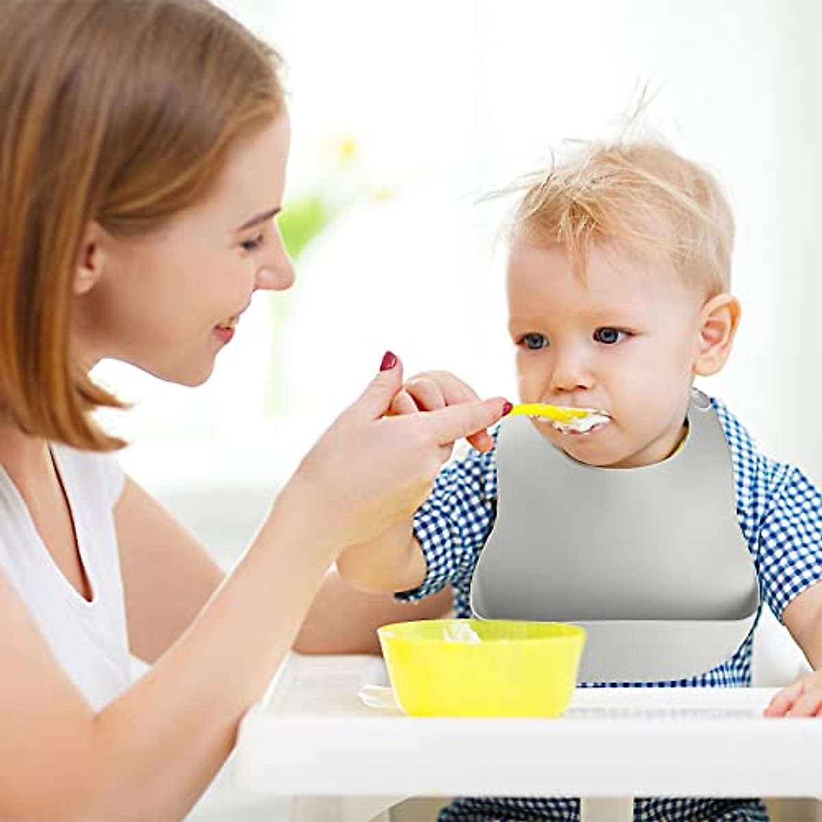 Himirt silicone baby bib and silicone baby spoon set, soft adjustable waterproof bib for babies and toddlers, with pockets to catch food. (1 yellow bib, 1 spoon)