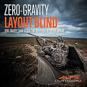 ALPS OutdoorZ Zero-Gravity Layout Blind - Advanced Hunting Blind in Realtree MAX-7, with Flared Fabric, Heavy-Duty Stakes, Padded Seat & Headrest, Gear Pockets, and Backpack Straps