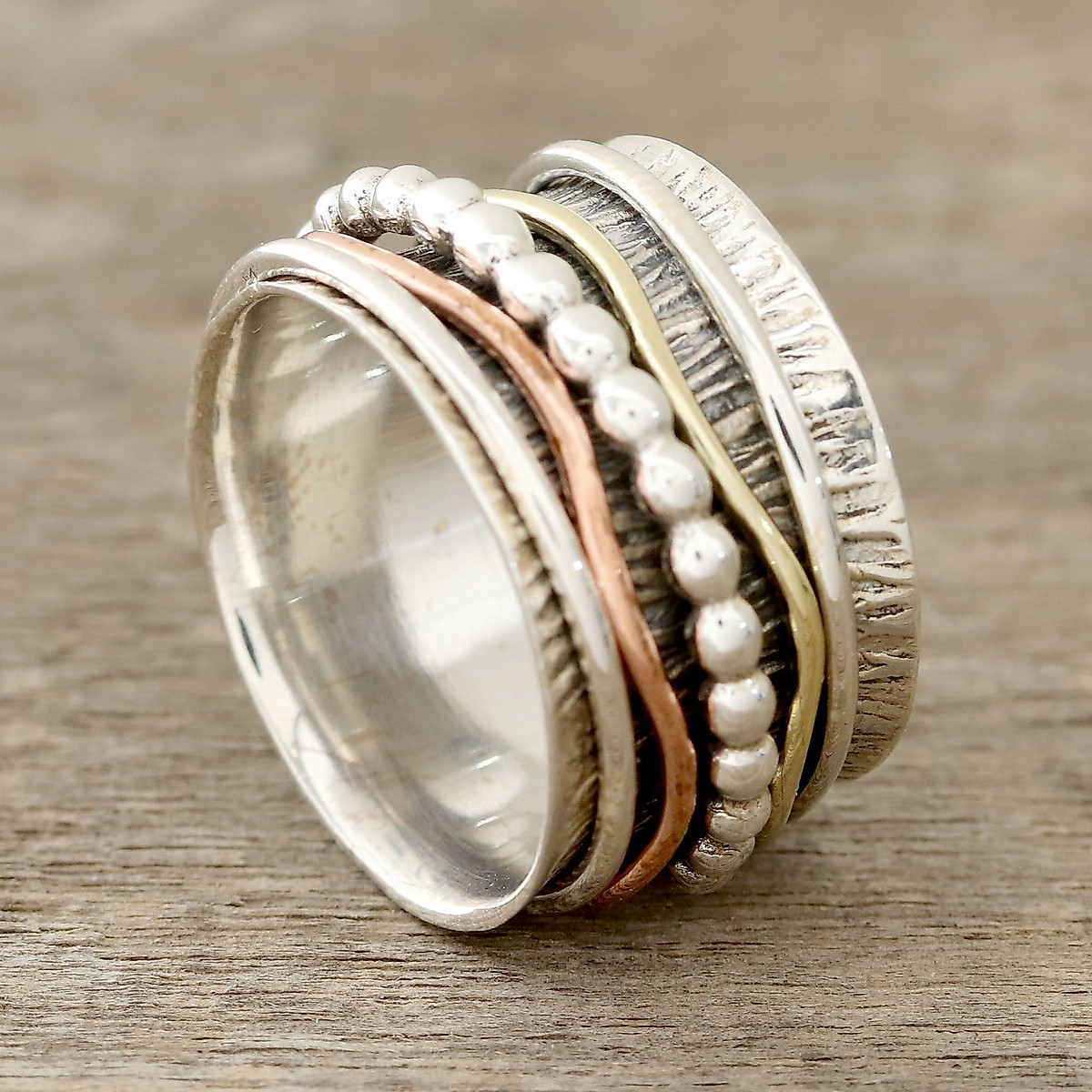 NOVICA Artisan handmade sterling silver spinner ring patterned rig with brass copper no stone meditation india [Band width 12 mm W] ' dotted flair'