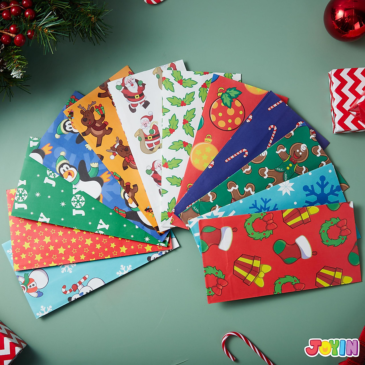 JOYIN 72 PCS of Christmas Holiday Goody Bags; 12 Assorted Christmas Designs Goodie Bags for Classrooms, Party Favors, Small Gift Bags, Kraft Bags and Christmas Craft Bags