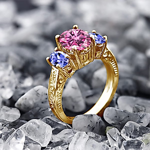 Gem Stone King 18K Yellow Gold Plated Silver 3-Stone Ring Oval Pink Moissanite and Tanzanite Blue (2.90 Cttw) (Size 7)
