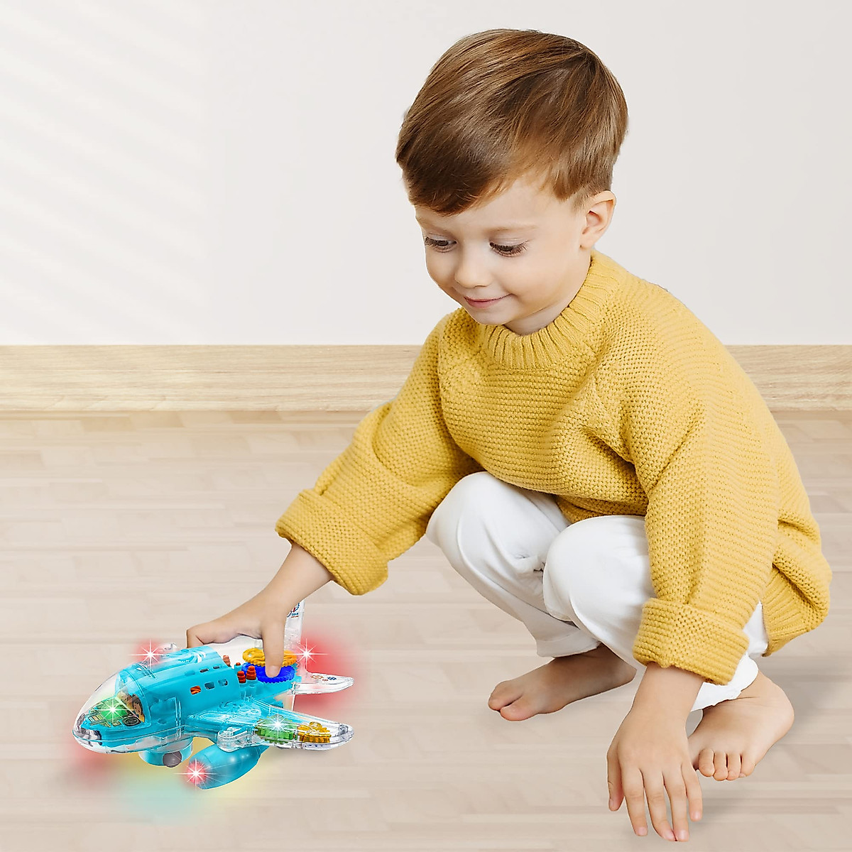 ArtCreativity Light-Up Transparent Airplane Toy for Toddlers 1-3, Fun Bump-and-Go Plane Toy for Kids 3-5, with Colorful Moving Gears, Music, and LED Effects - Perfect Airplane Gift for Boys and Girls