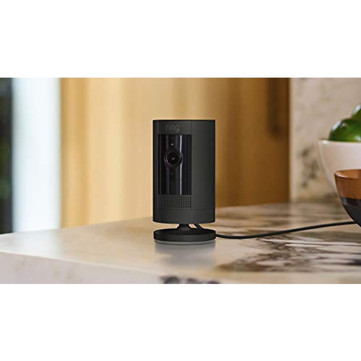 Ring Stick Up Cam Plug-In HD security camera with two-way talk, Works with Alexa - Black