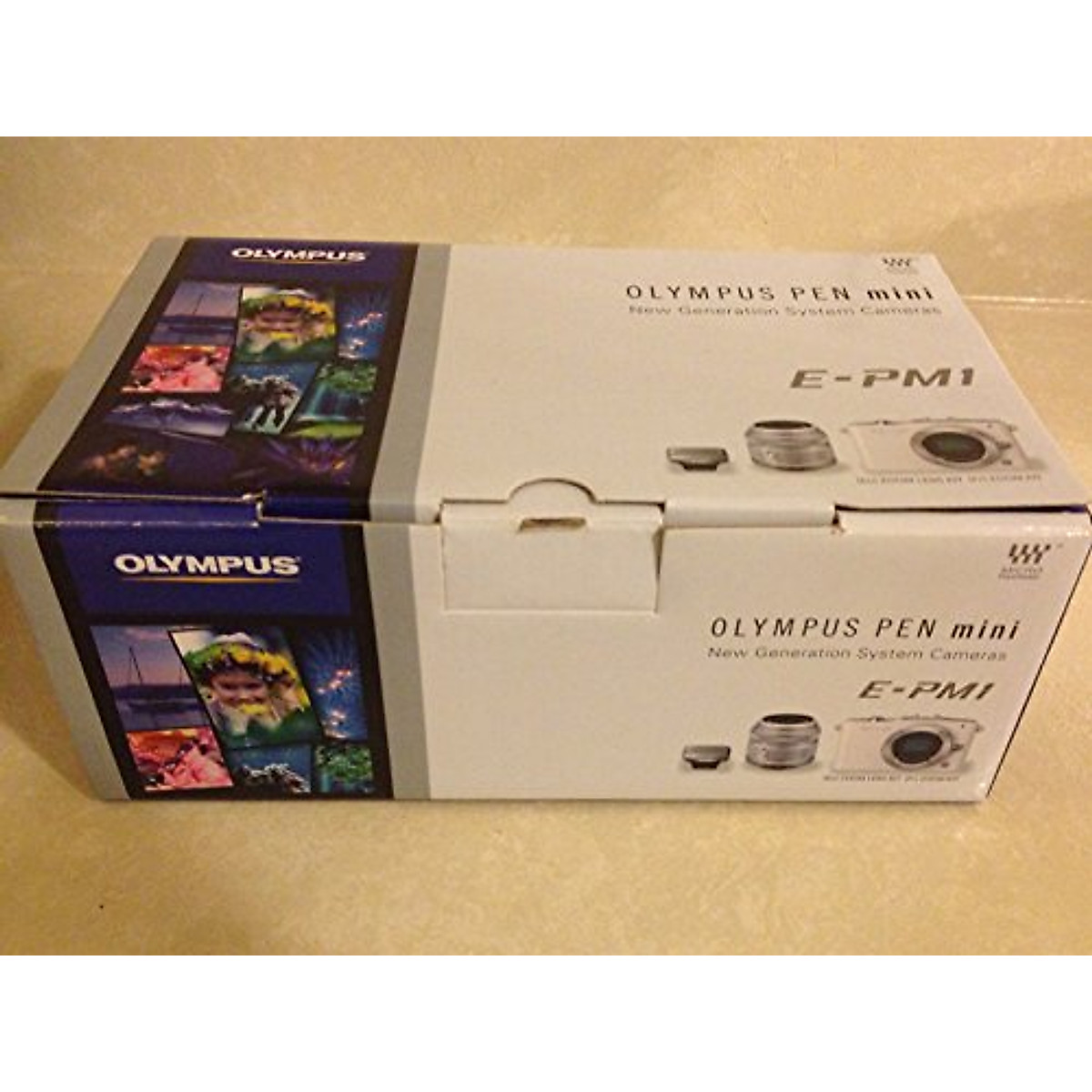 Olympus PEN E-PM1 12.3MP Interchangeable Camera with CMOS Sensor, 3-inch LCD and 14-42mm II Lens (Black) (Old Model)