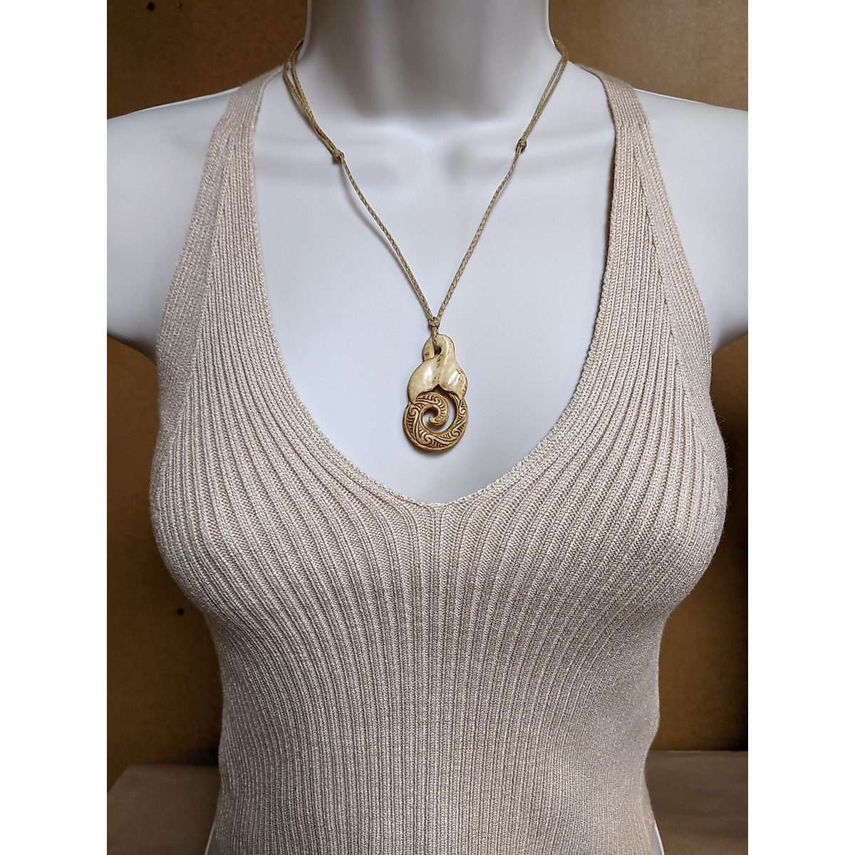 Earthbound Pacific Hand Carved Aged Bone Whale Tail Necklace with Infinity Loop and Spiral