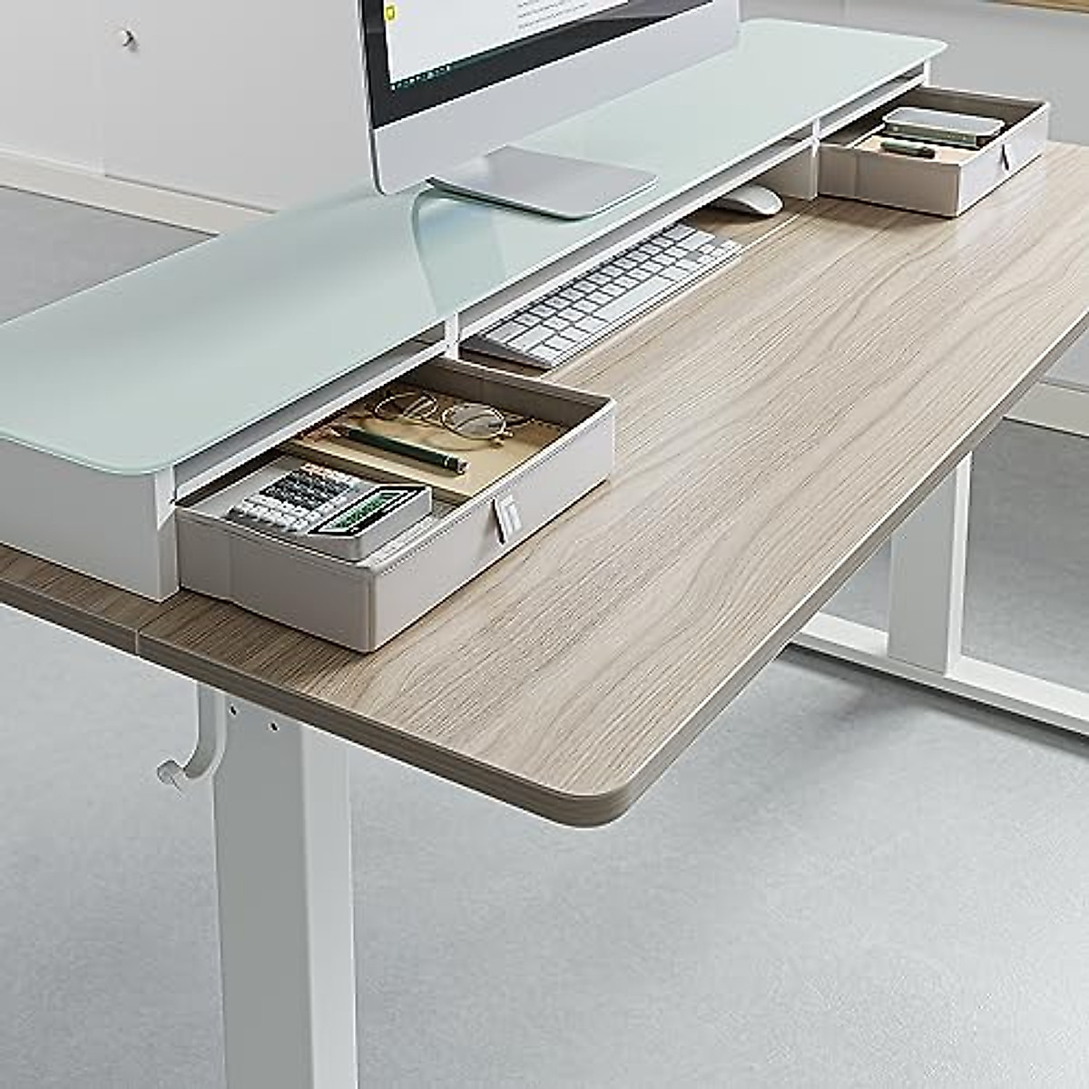 FEZIBO Electric Standing Desk with Double Drawers, 55 x 24 Inch Glass Top Monitor Stand Adjustable Sit Stand Desk with Storage Shelf, White Frame/LightWalnut Top