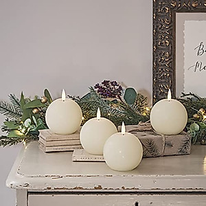 Lights4fun, Inc. Set of 4 TruGlow Ivory Distressed Wax Flameless LED Battery Operated Sphere Candles with Remote Control