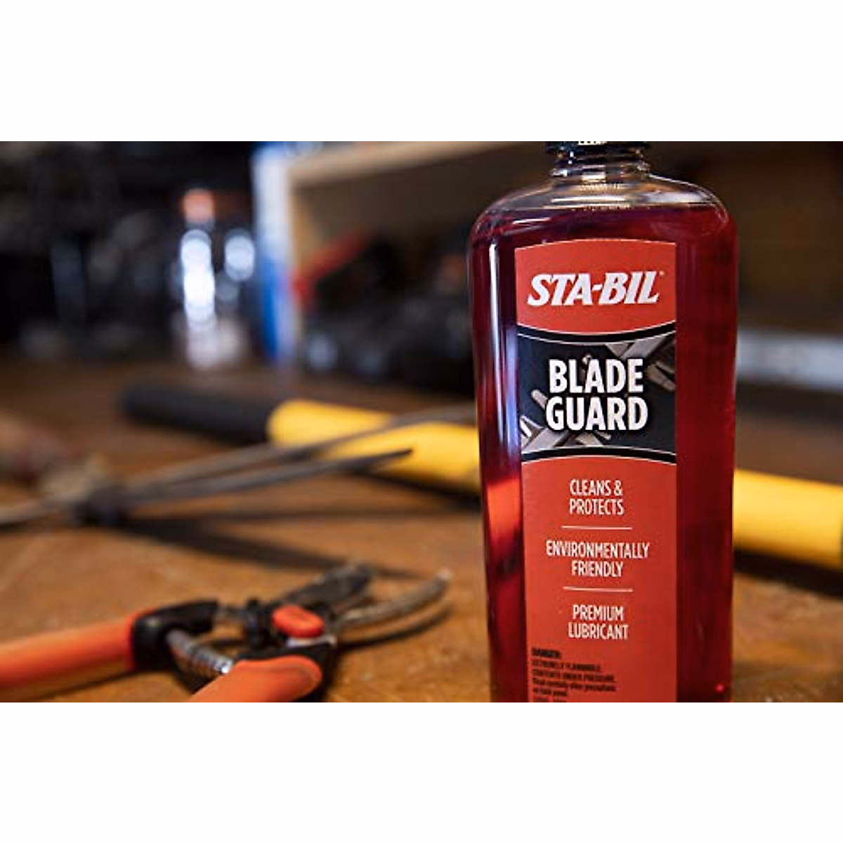 STA-BIL Blade Guard - Premium Blade Lubricant, Helps Maintain Blade Edge, Will Not Harm Plants, Protects Against Rust and Corrosion, Safe for Use On Gas and Electric Equipment, 12oz (22503), Orange