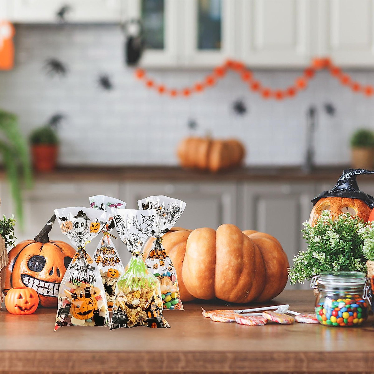 TOEKSIX Halloween Cellophane Treat Bags, 180pcs Halloween Trick or Treat Goodie Bags with 200pcs Gold Twists for Snacks Cookies Candies Packing, Skeleton Man Halloween Candy Bags Party Favor Supplies