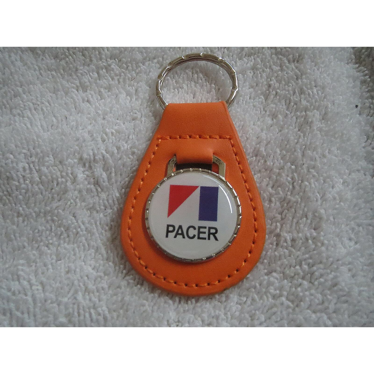 1975 1976 1977 1978 1979 AMC PACER LOGO EMBLEM LEATHER KEYCHAIN - PUMPKIN