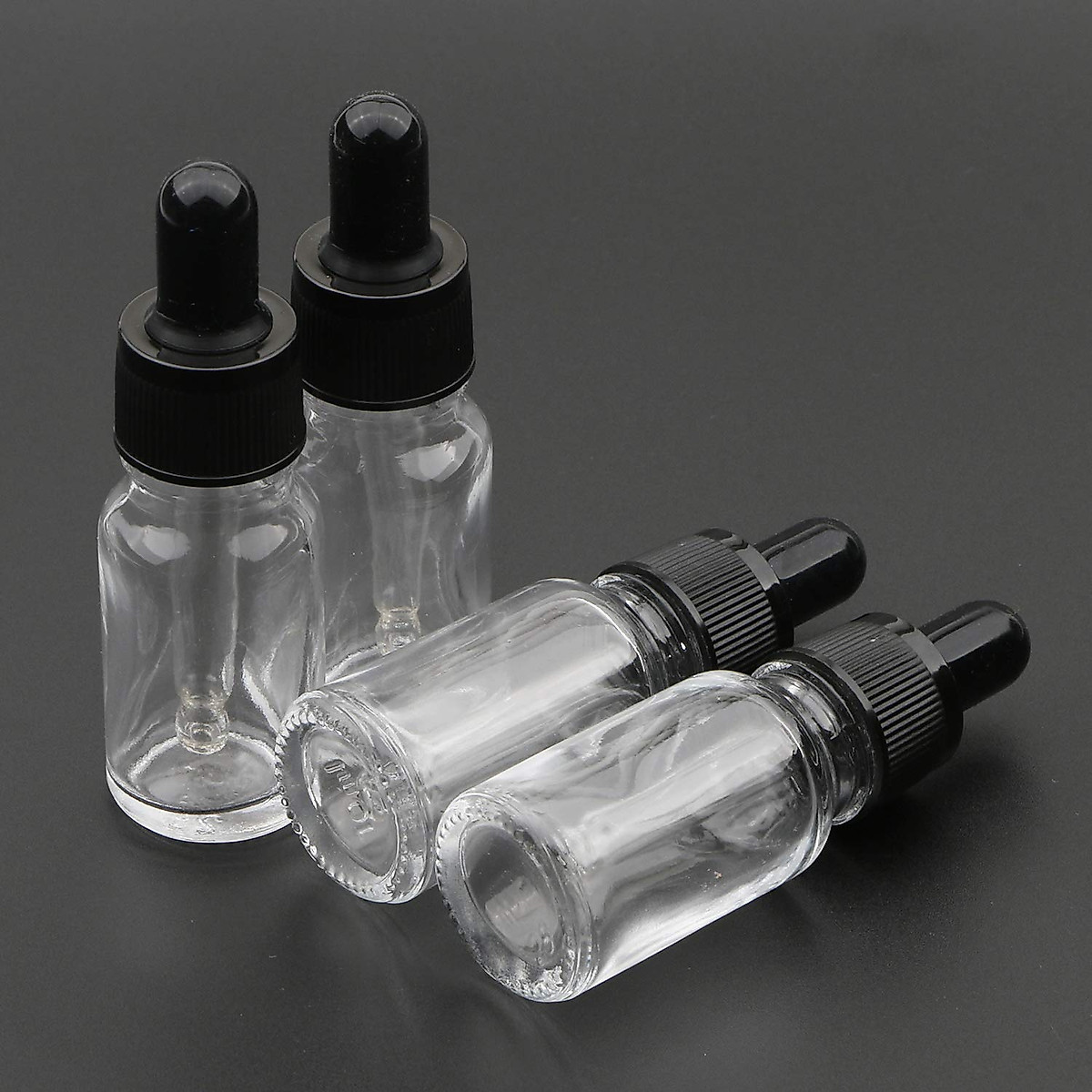 Kesell 8pcs Empty Refillable Clear Glass Essential Oil Bottles, 10ml Sample Storage Containers Vials Jars with Eye Dropper Dispenser and Black Screw Cap