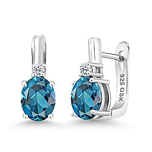 Gem Stone King 925 Sterling Silver London Blue Topaz and White Topaz Earrings For Women (3.76 Cttw, Gemstone November Birthstone, Oval 9X7MM)