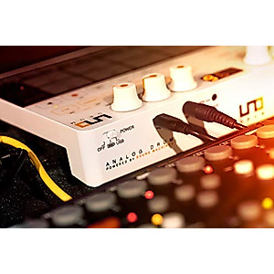 IK Multimedia UNO Drum analog and digital drum machine with 6 analog voices, 64-Step Sequencer, USB and 2.5mm MIDI, 100 pattern presets, battery-powered and portable