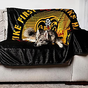Surreal Entertainment Cobra Kai Strike First Oversized Plush Throw Blanket | Cozy Sherpa Cover For Sofa, Bed Super Soft Fleece Official Karate Kid Collectible 45 x 60 Inches, Yellow, One Size