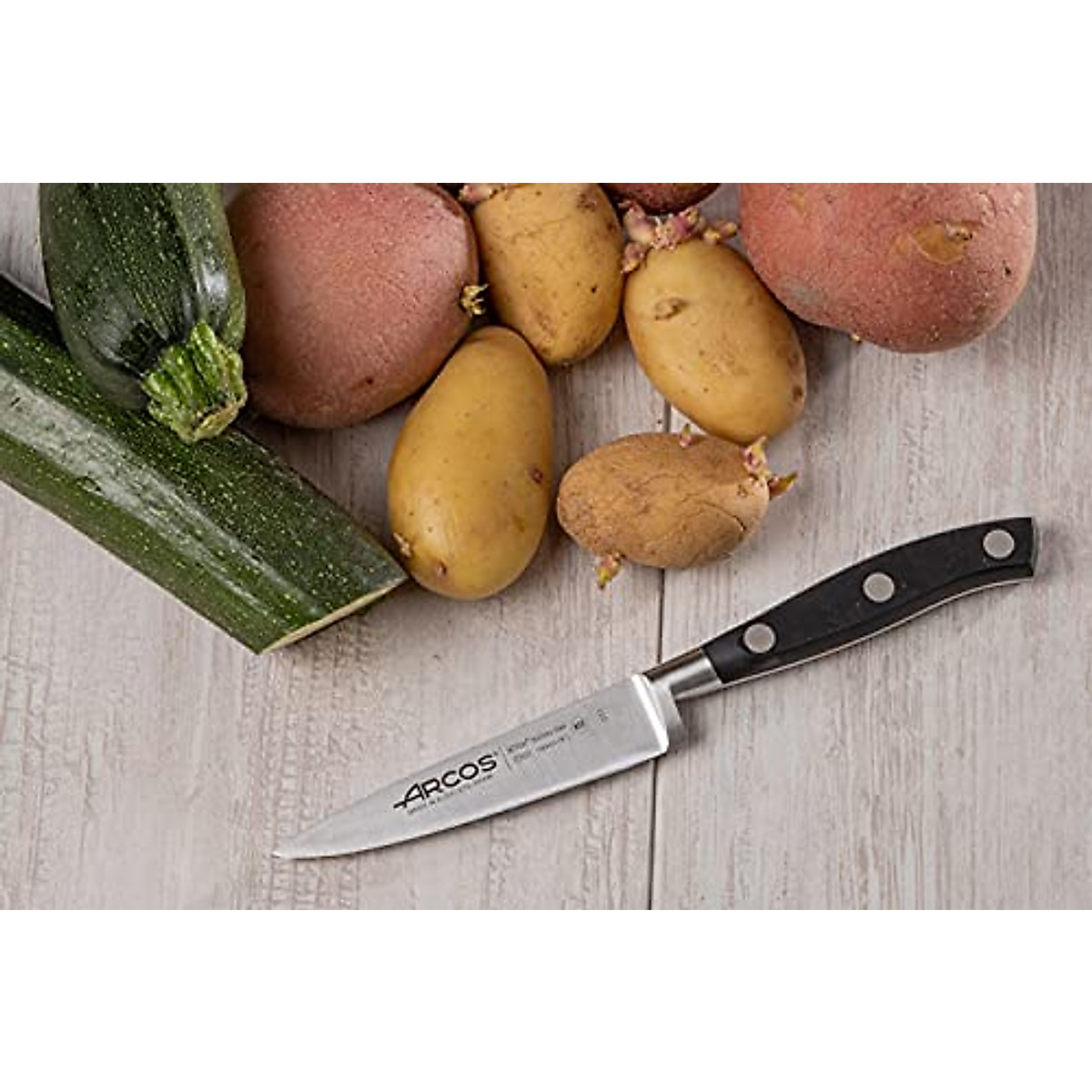 ARCOS Paring Knife 4 Inch Stainless Steel. Kitchen Knife for Peeling Fruits and Vegetables. Ergonomic Polyoxymethylene Handle and 100mm Blade. Series Riviera. Color Black