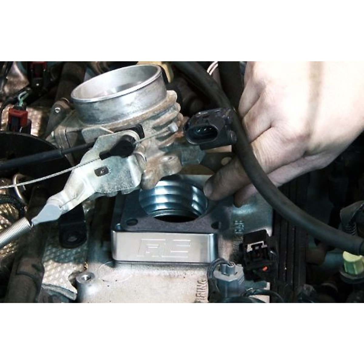 Rough Country Throttle Body Spacer for 87-06 Jeep Wrangler TJ/YJ/XJ/MJ - 1068