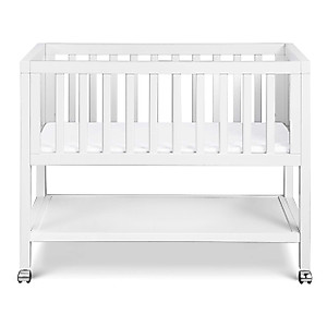 DaVinci Archie Portable Bassinet in White, Removeable Wheels, Greenguard Gold Certified